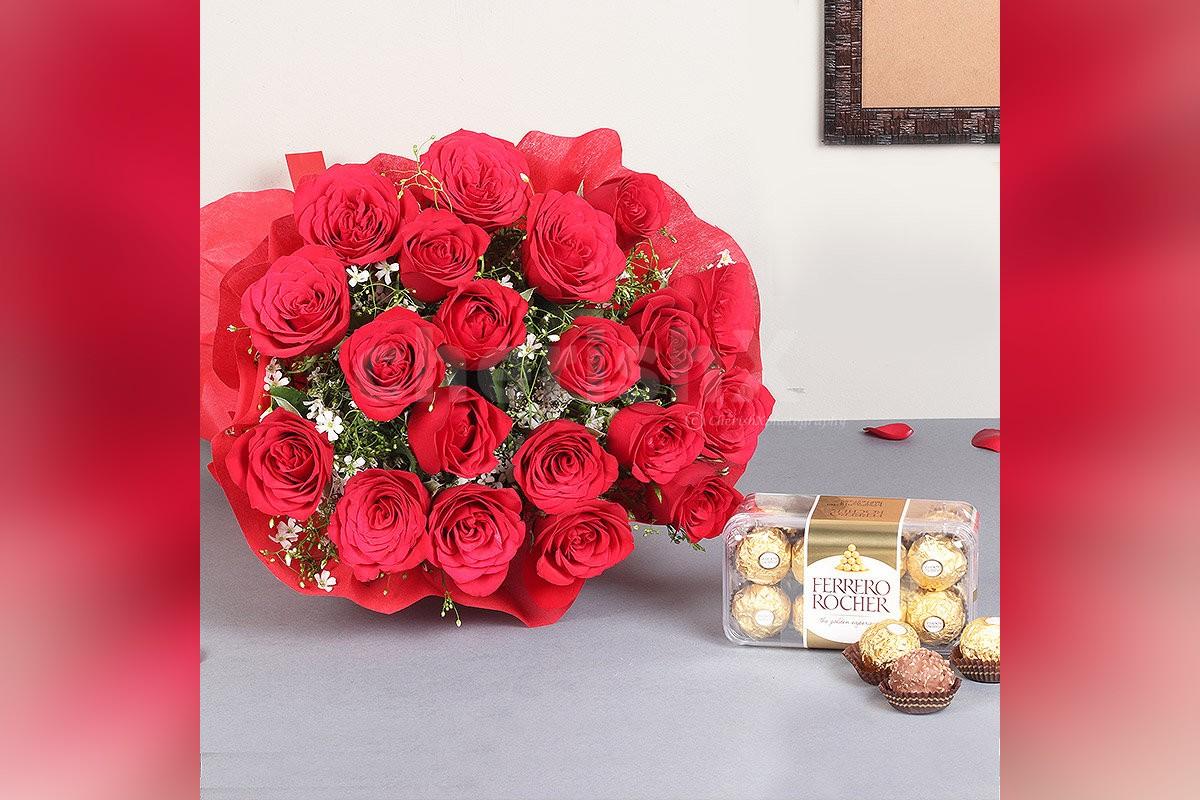 Send a simple 20 Red Rose in red paper package with 16 Ferrero Rocher ...