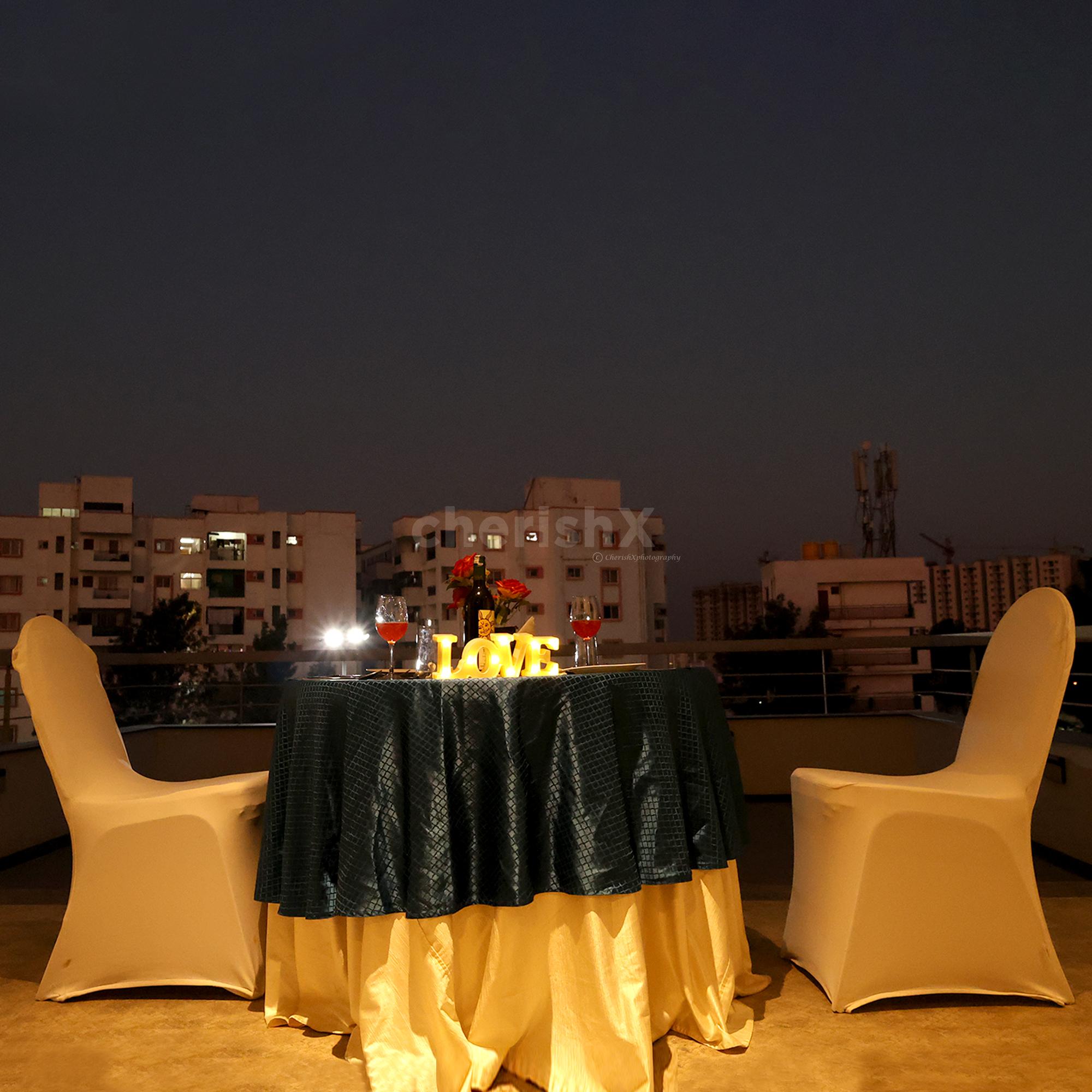 Savor each bite with our Romantic Rooftop Dining under the stars ...